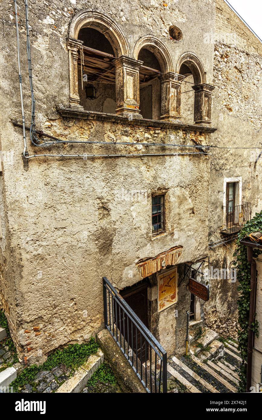 The ancient arches that protect the loggia of the Casa Antica in the ...