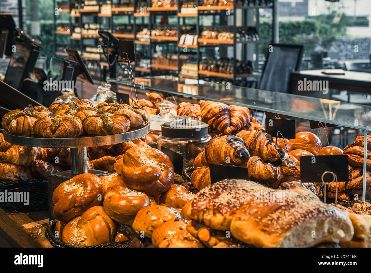 Delicious baked goods in the counter of a modern bakery and pastry shop ...