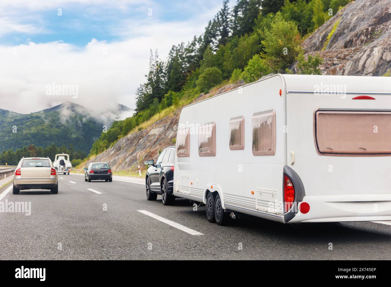 Scenic view big modern white family rv camper van vehicle drive Europe ...