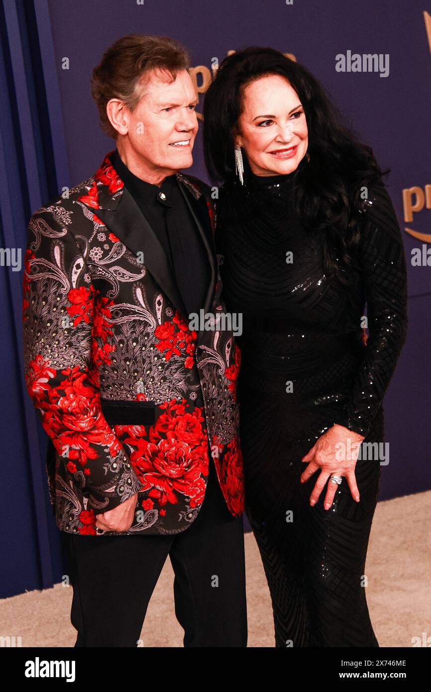 Randy Travis and Mary Davis attends the 59th Academy of Country Music ...