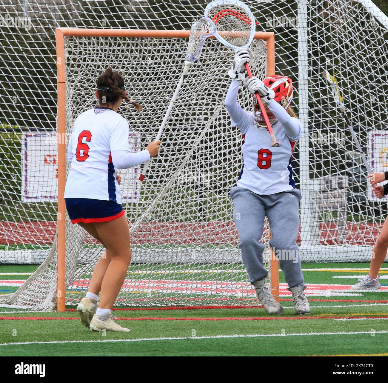 Goalie making a save in a high school girls lacrosse game Stock Photo ...