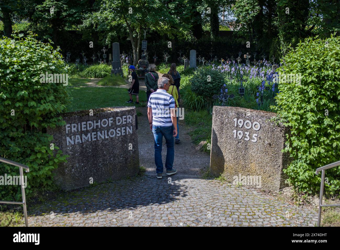 People are seen entering the Cemetery of the Nameless - Friedhof der ...
