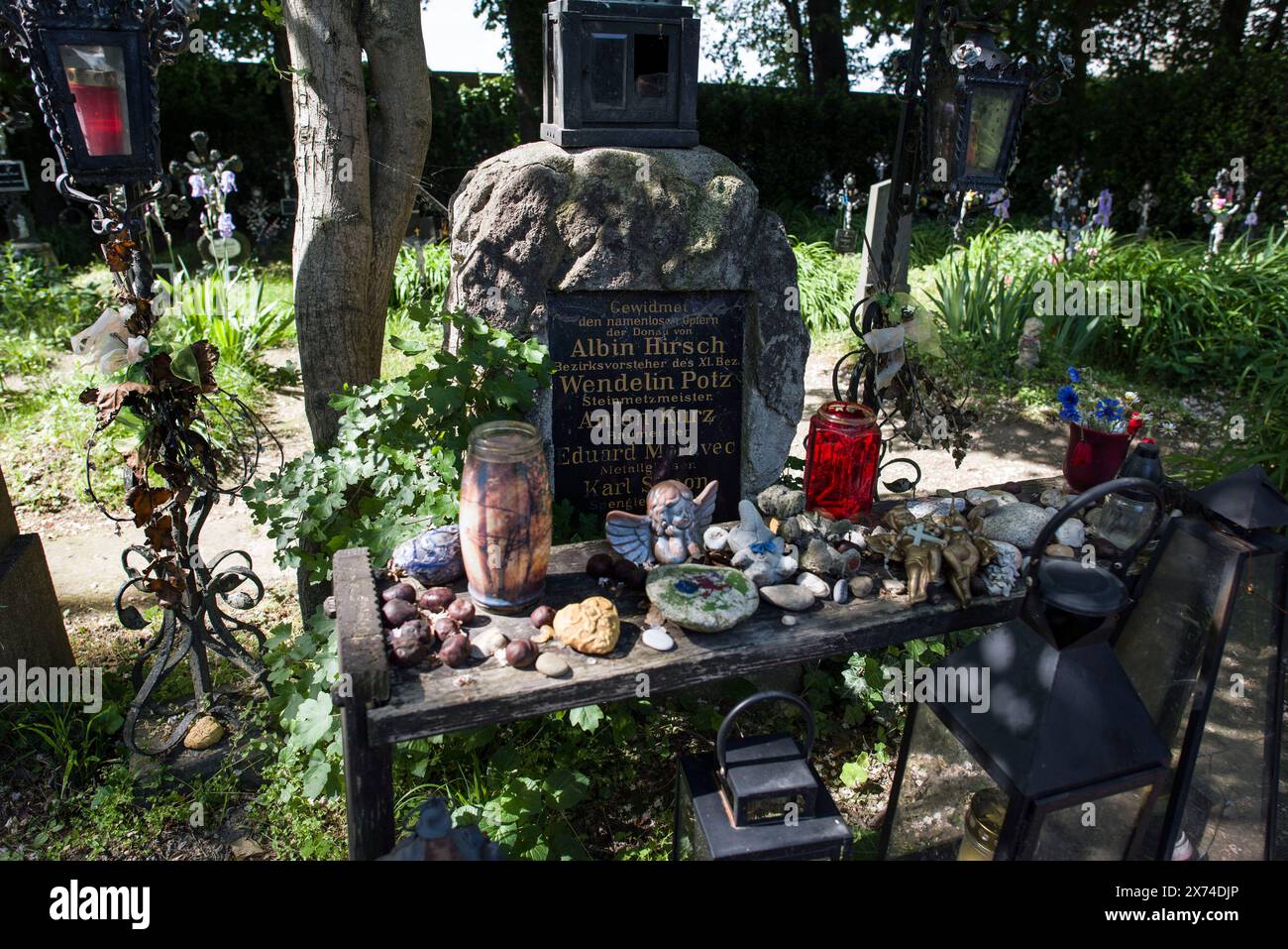The words on a stone reads the names of people who created the cemetery ...