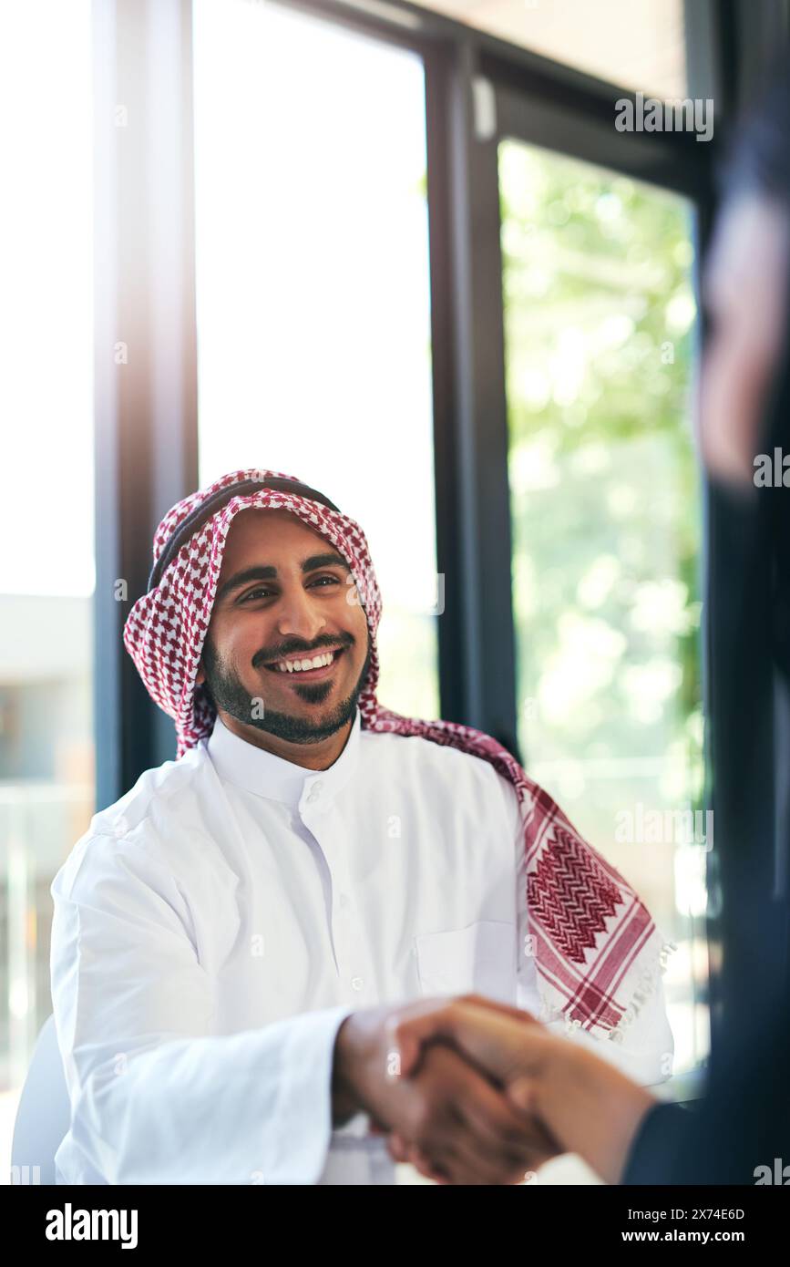 Handshake, islamic businessman and office for meeting, keffiyeh and ...