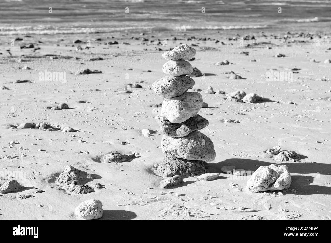 zen like summer. stone pyramid at sea. summer nature with zen pebble ...