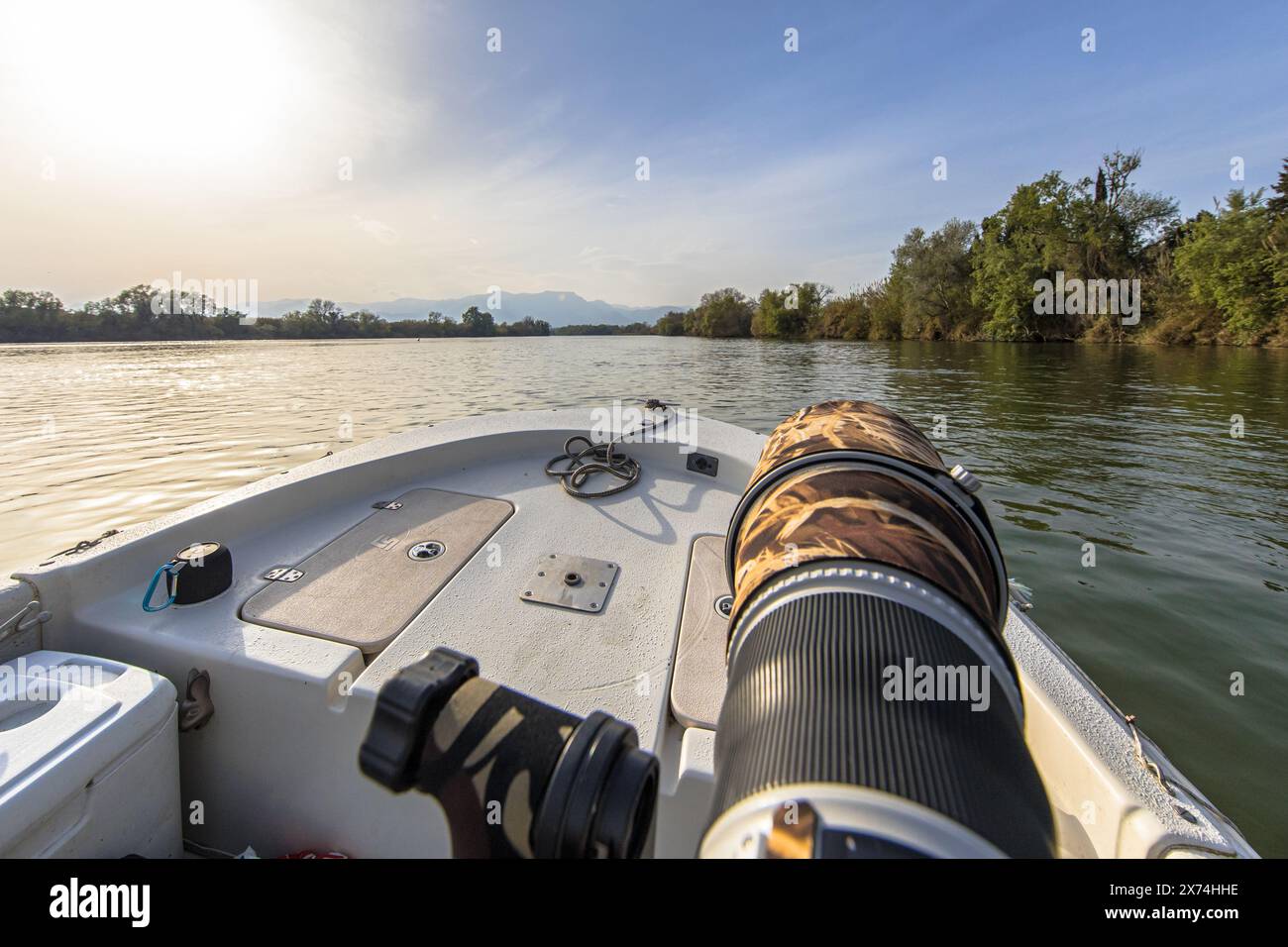 Birdwatching boat trip on river Ebro. Observer POV. Big telephotolens ...