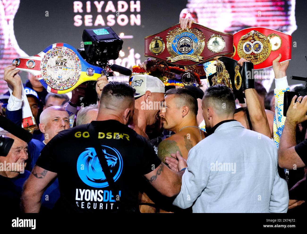 Tyson Fury and Oleksandr Usyk face off during a weigh-in at BLVD City ...