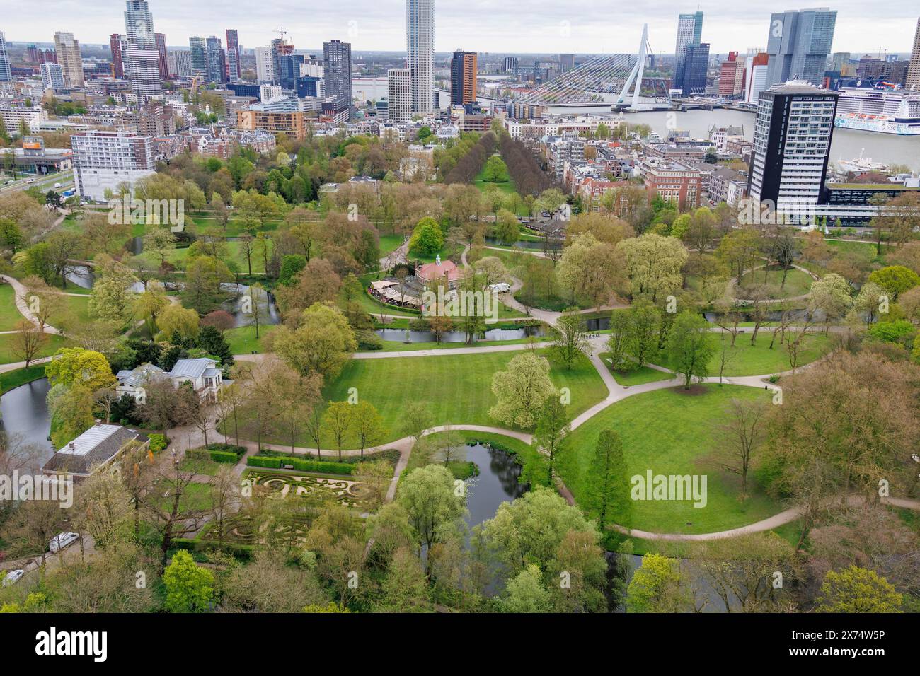 Expansive view of a green park in the middle of the cityscape with tall ...
