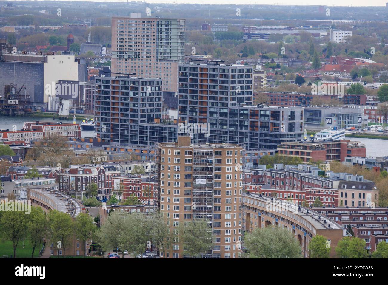 View of urban residential buildings and river with multi-storey ...