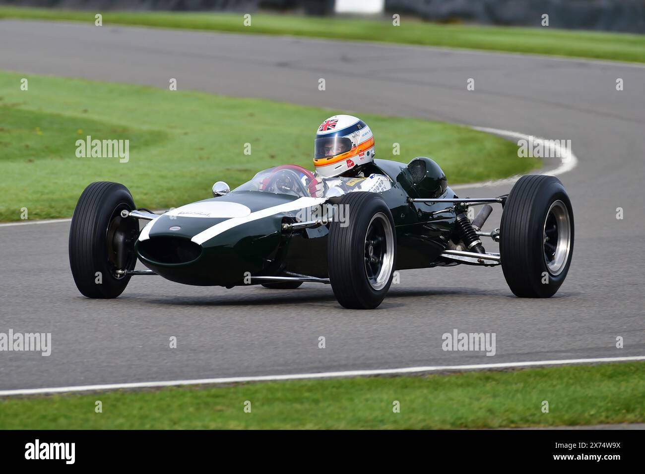 Derek Bell does a parade lap in Jackie Stewarts title winning Cooper F3 ...