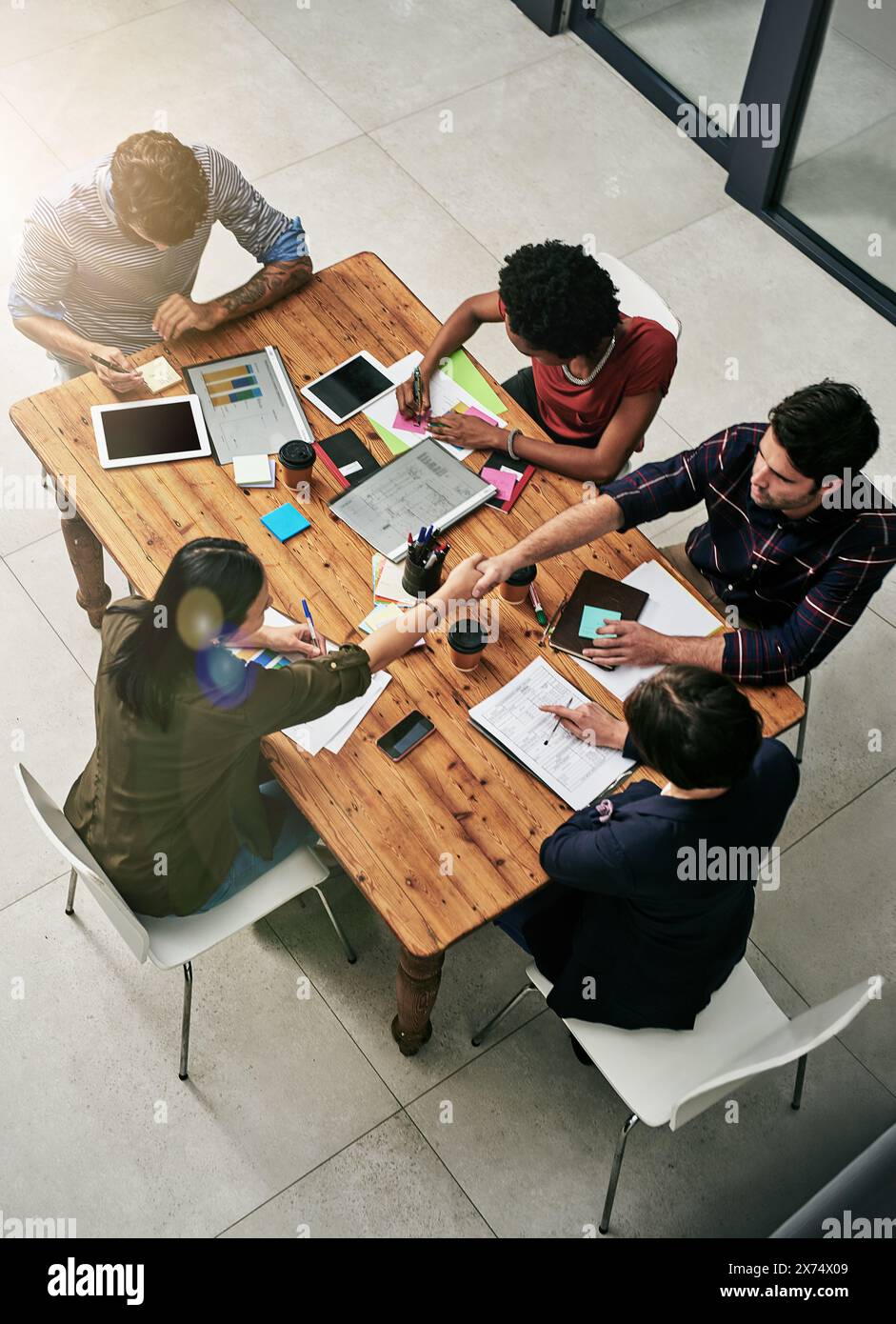 Meeting, business people and handshake in office for planning ...