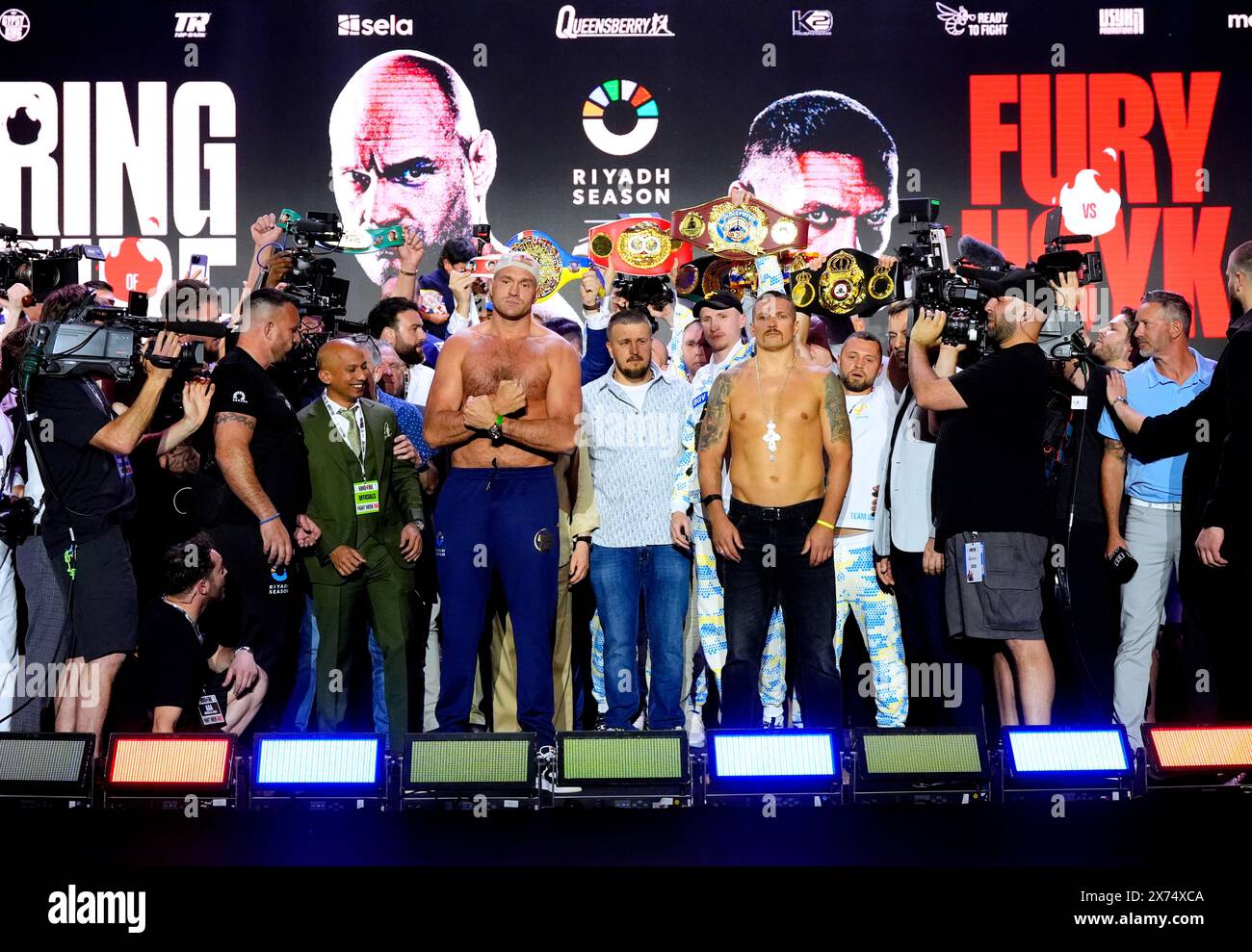 Tyson Fury and Oleksandr Usyk during a weigh-in at BLVD City Music ...