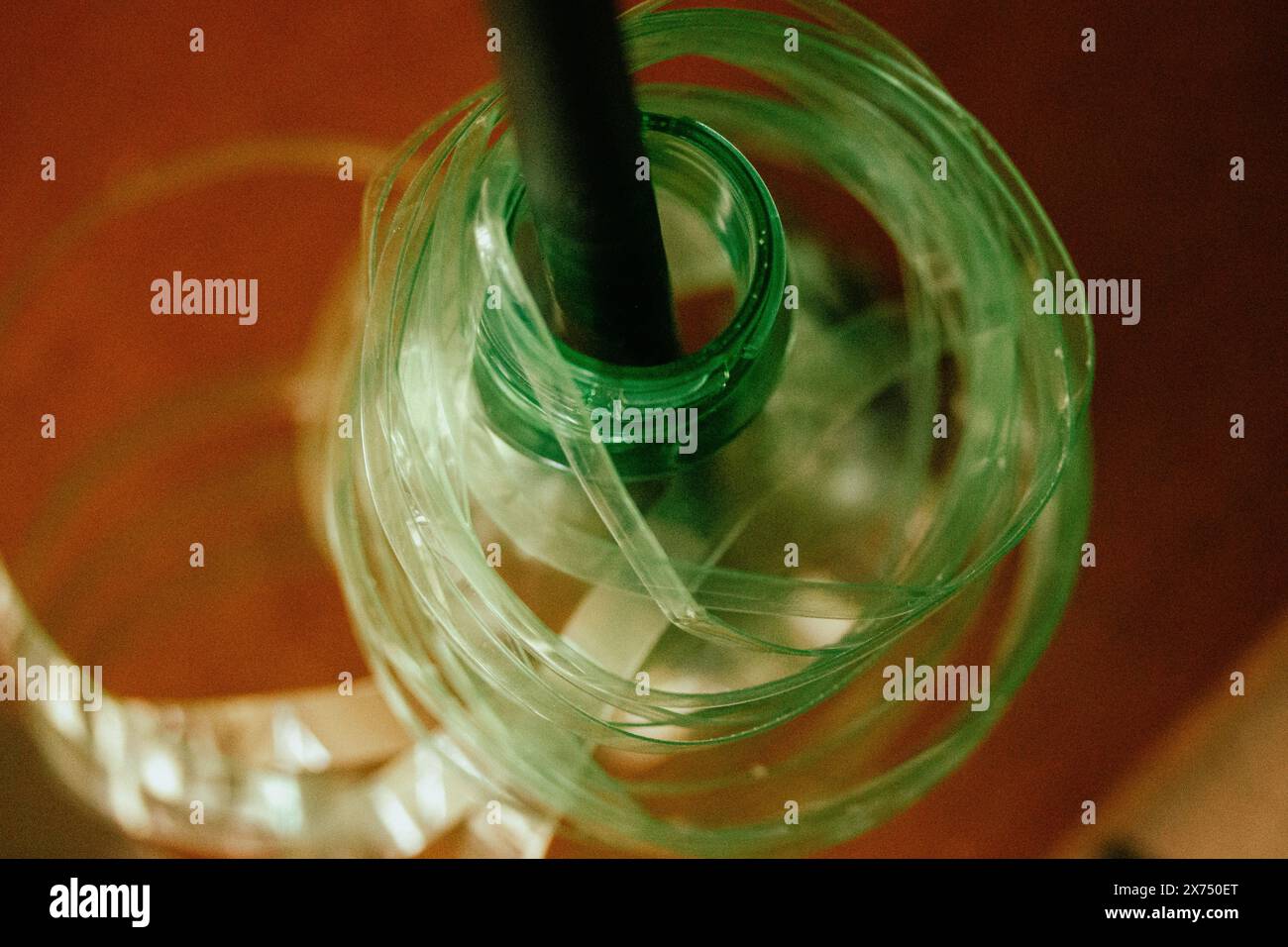 Recycling green plastic bottle to be reused for manufacturing. New life ...