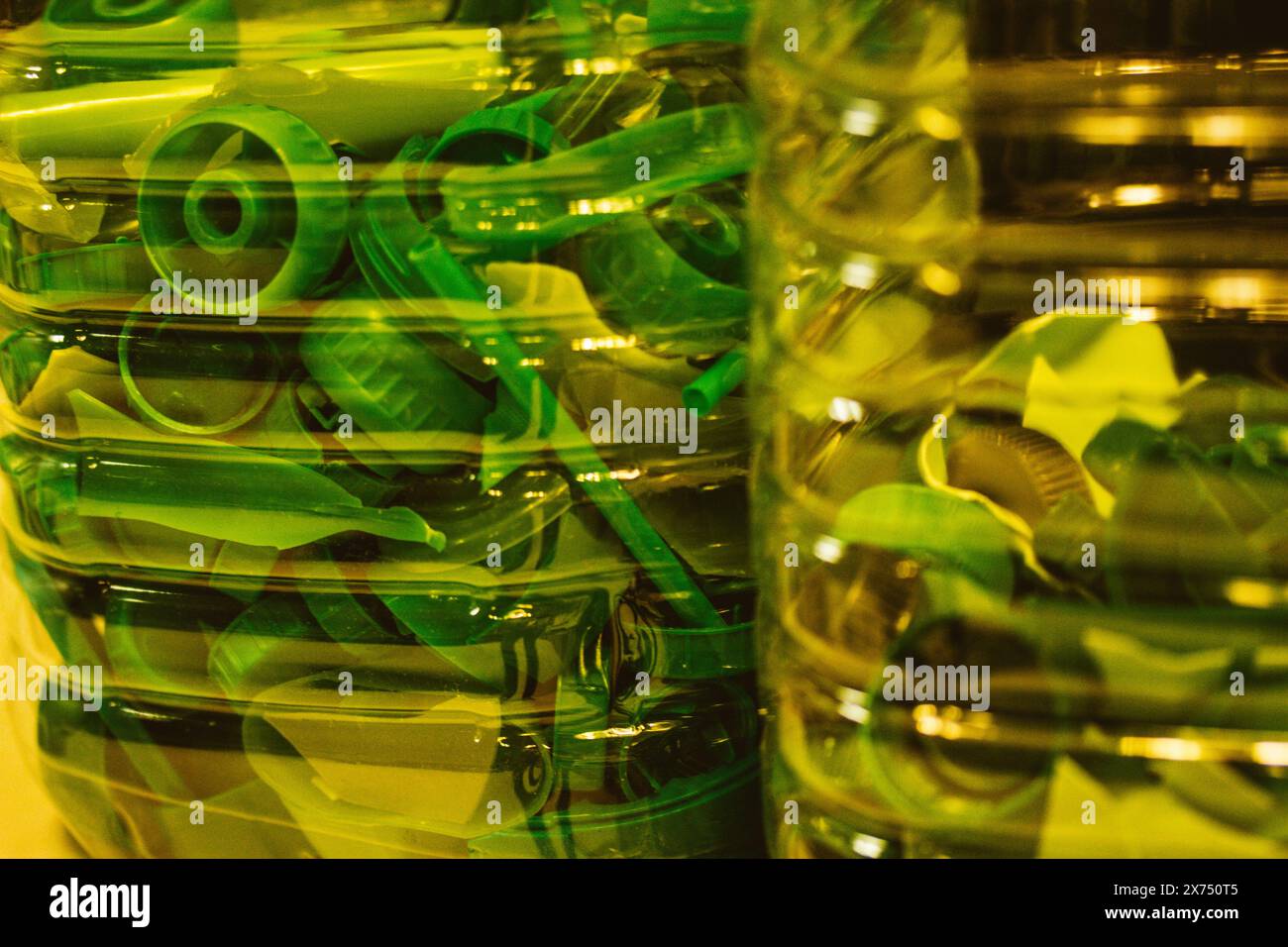 Recycling green plastic bottle caps to be reused for manufacturing. New ...