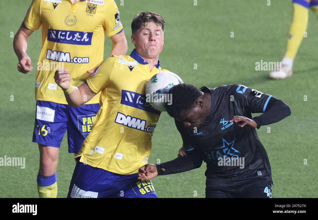 Sint Truiden, Belgium. 17th May, 2024. STVV's Rein Van Helden and OHL's ...