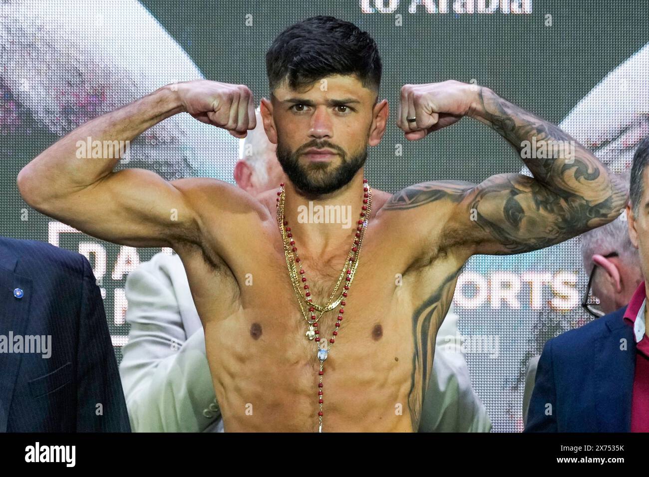 Professional boxers Welsh-Maltese Joe Cordina shows his muscles during ...