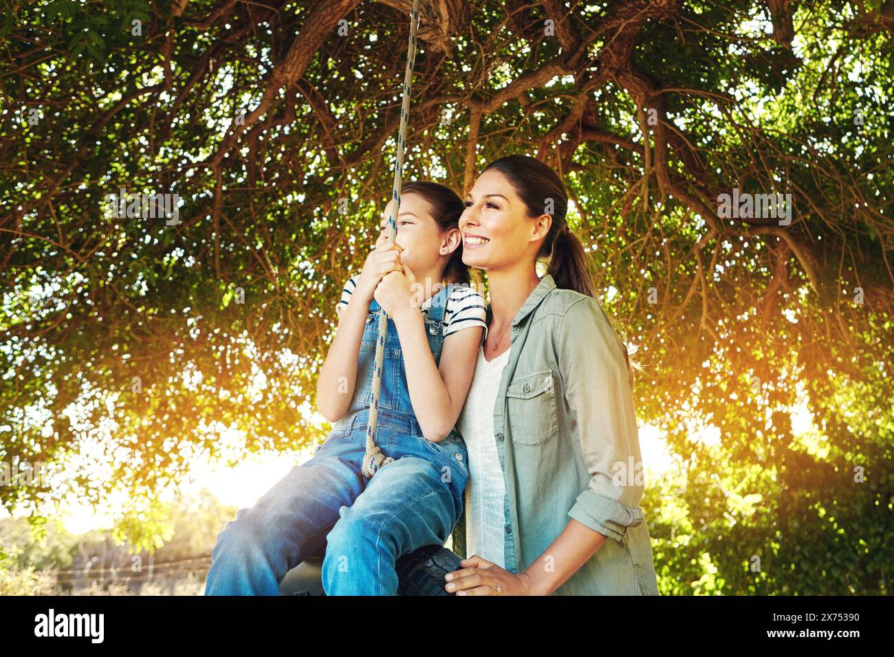 Smile, mother and child on swing at park for bonding and play fun game ...