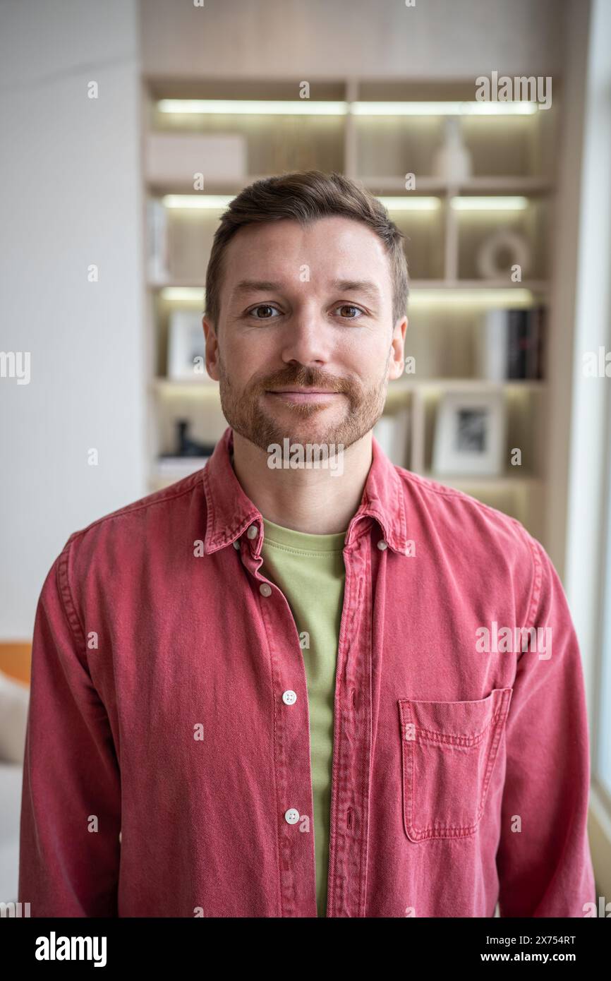 Portrait calm friendly smiling positive middle aged man with stubble ...
