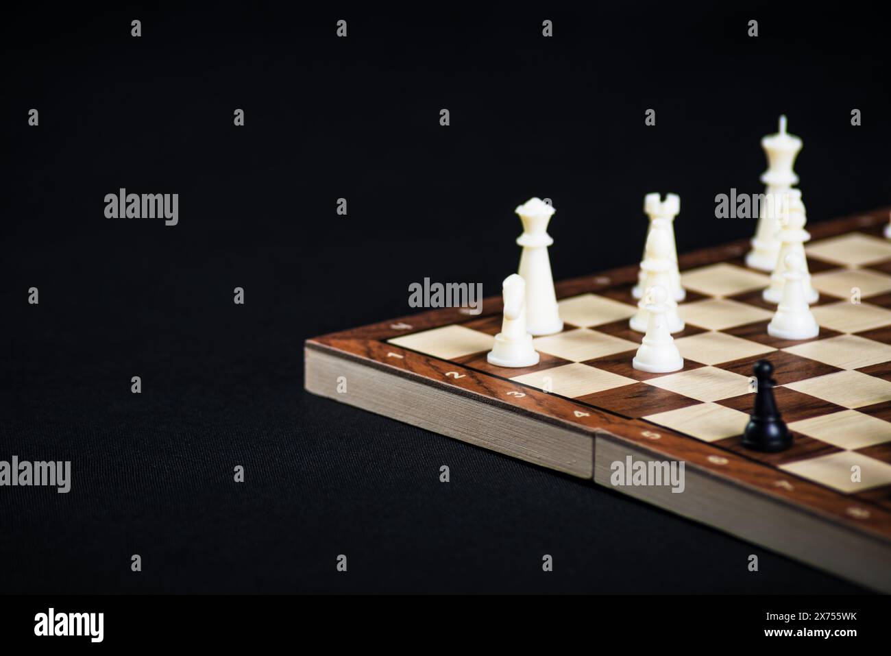 Chess board with pieces. Game concept. Board game. Hobby. Game on black ...