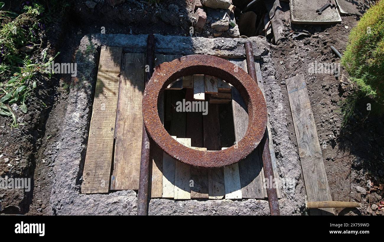 Preparation for the installation of a manhole in a water well Stock ...