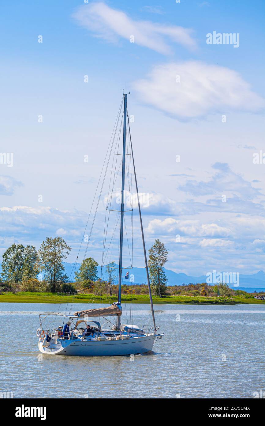 Sailing vessel Etoile departing Steveston Channel in British Columbia ...