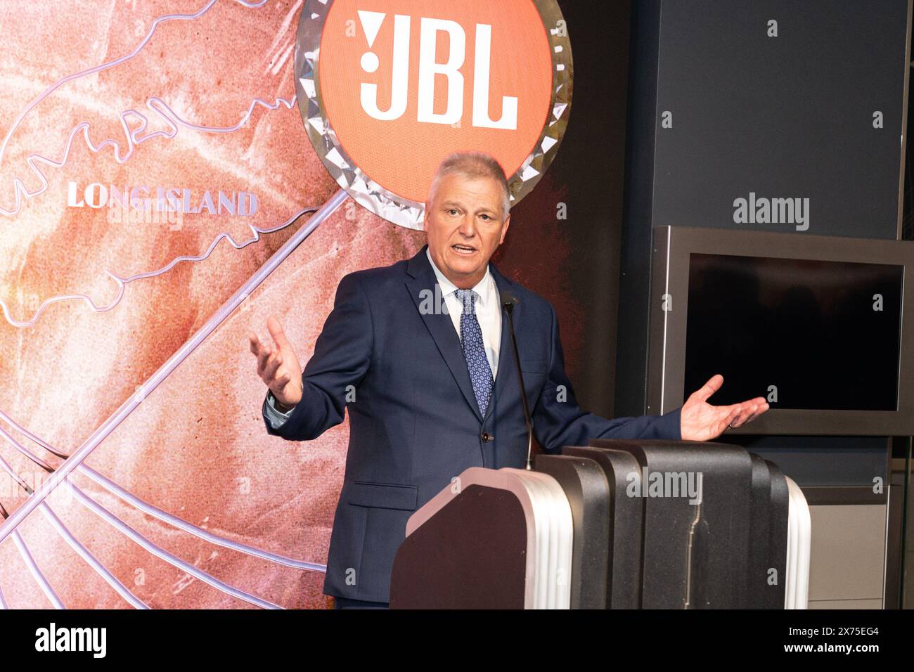 Michael Mauser, President and CEO of HARMAN speaks as he visits Empire State Building in New ...