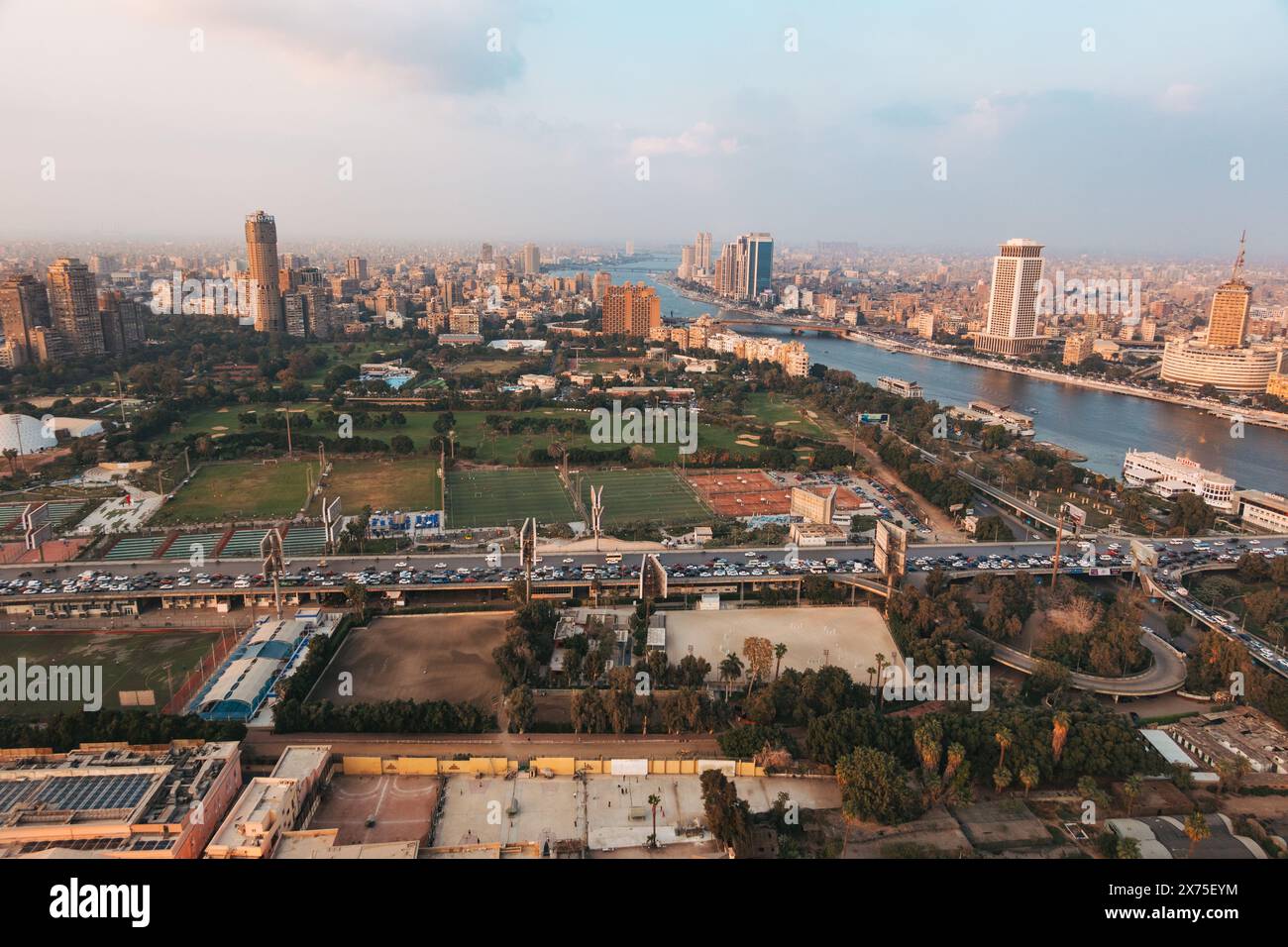 Aerial view of Cairo with the Nile, modern towers, bridges, and dense ...