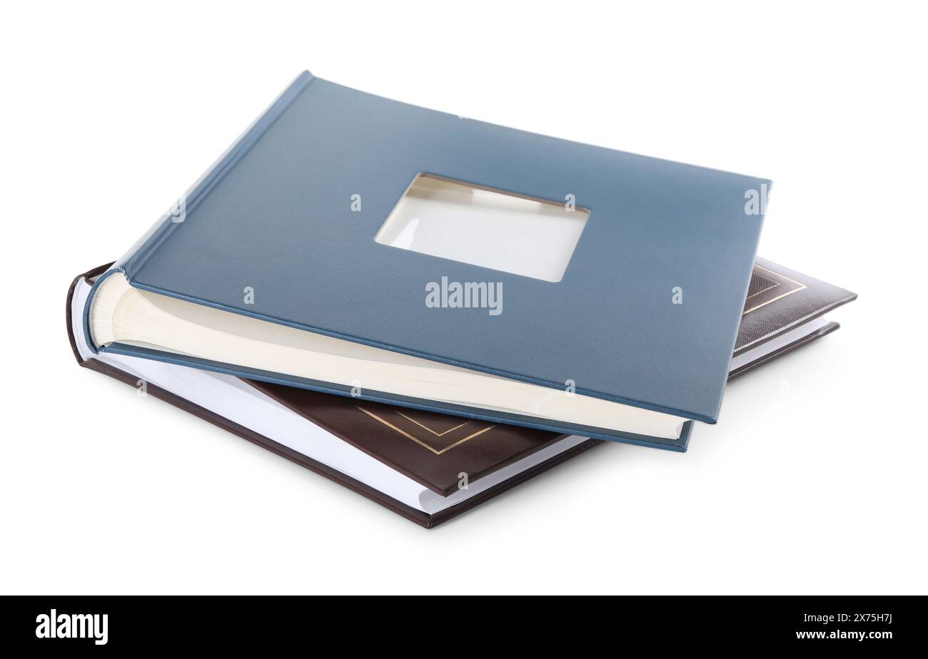 Two closed photo albums isolated on white Stock Photo - Alamy