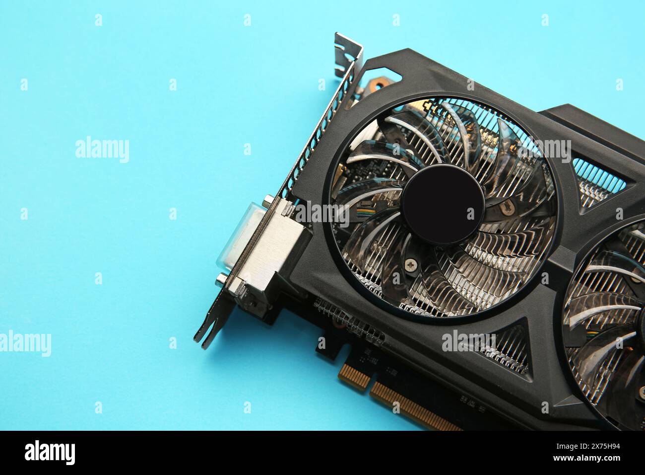 One graphics card on light blue background, top view. Space for text ...