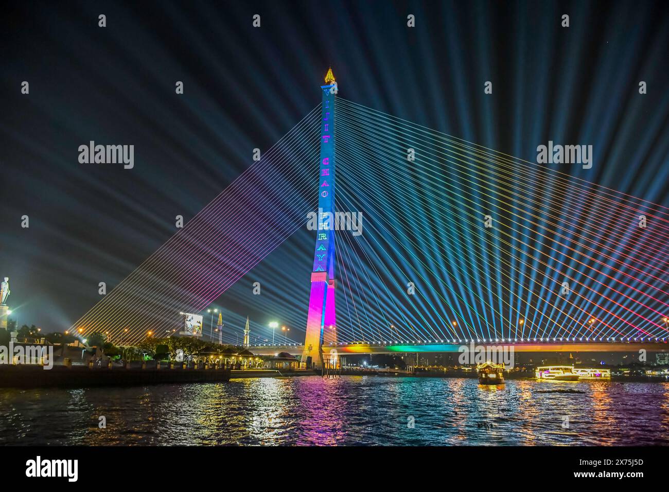 Neon lighting on Rama VIII Bridge on chao phraya river in Bangkok city ...