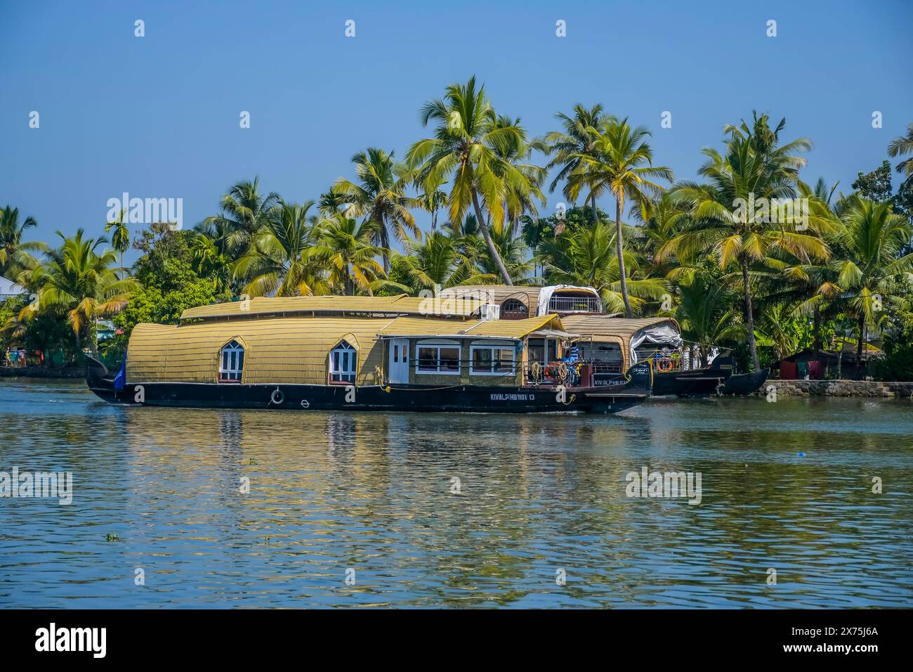 Houseboat in Kerala backwater sailing through the canals in Alleppey ...
