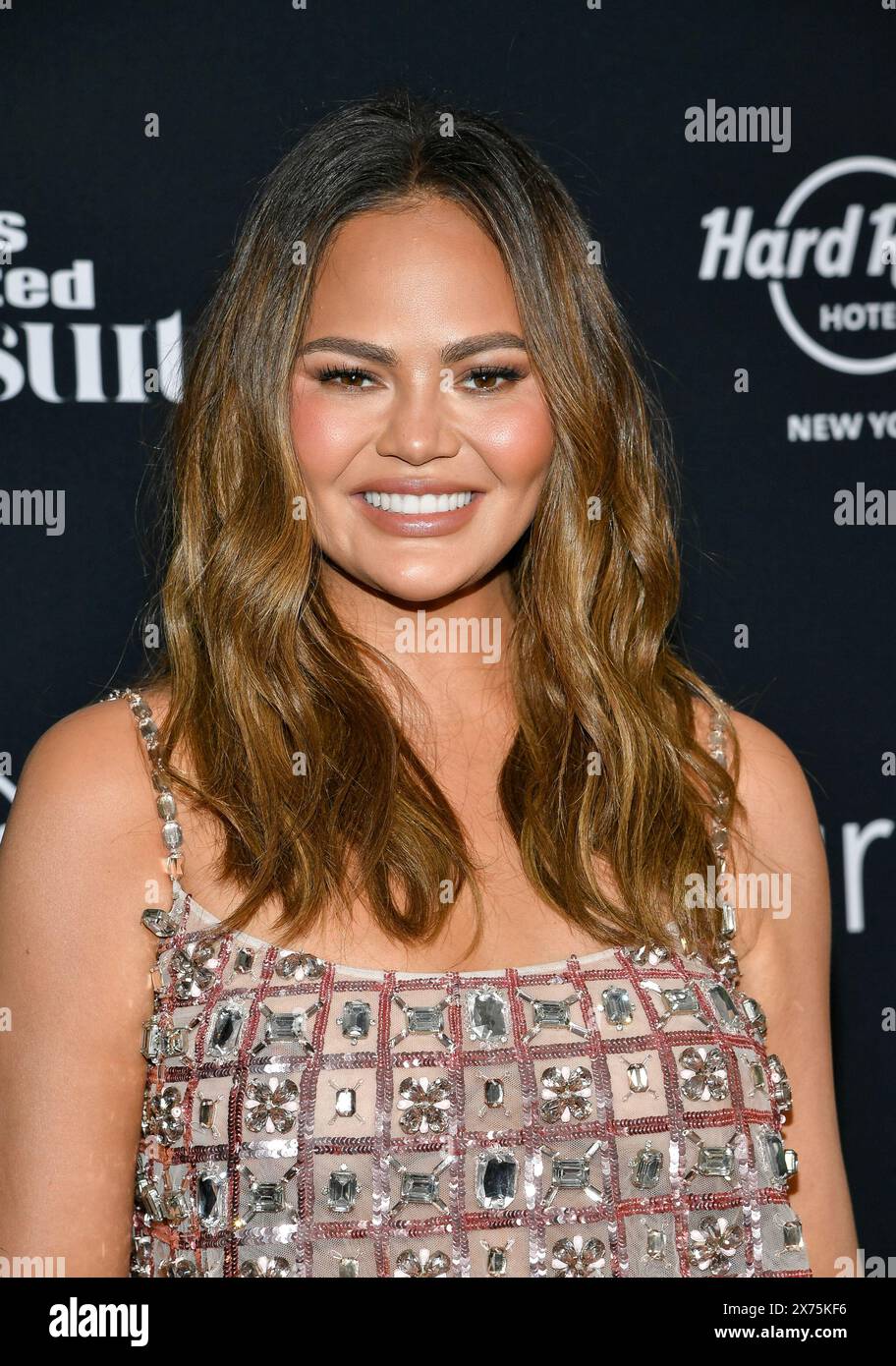 Chrissy Teigen attends the Sports Illustrated Swimsuit 60th anniversary ...