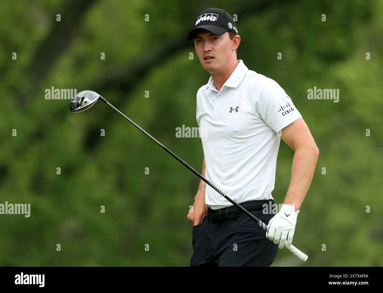 Maverick McNealy watches his tee shot on the fifth tee during round two ...