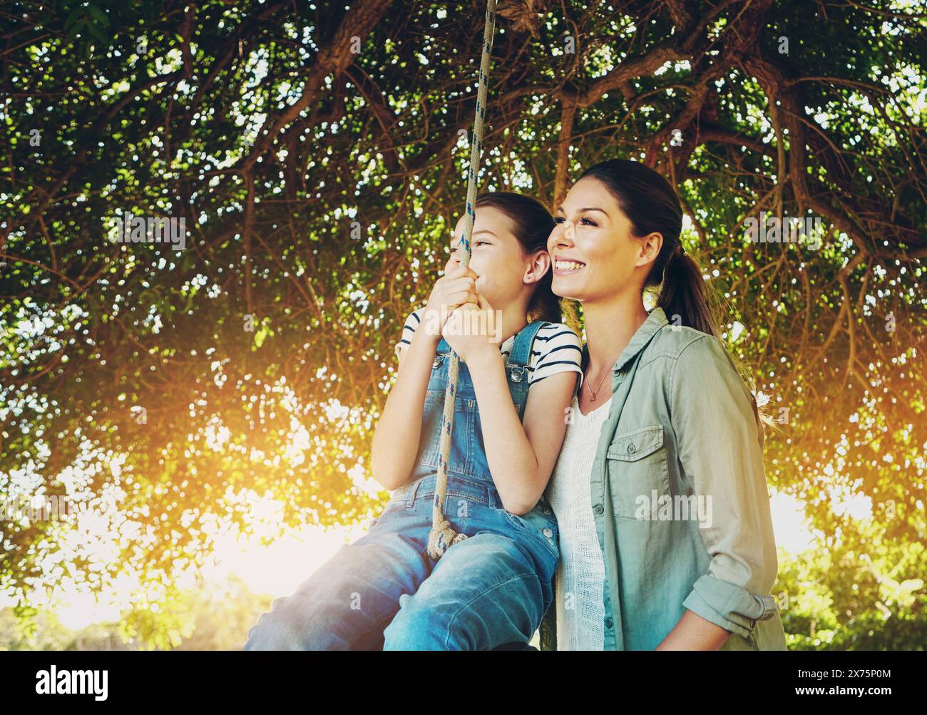 Smile, mother and child on swing outdoor for bonding and kid play fun ...