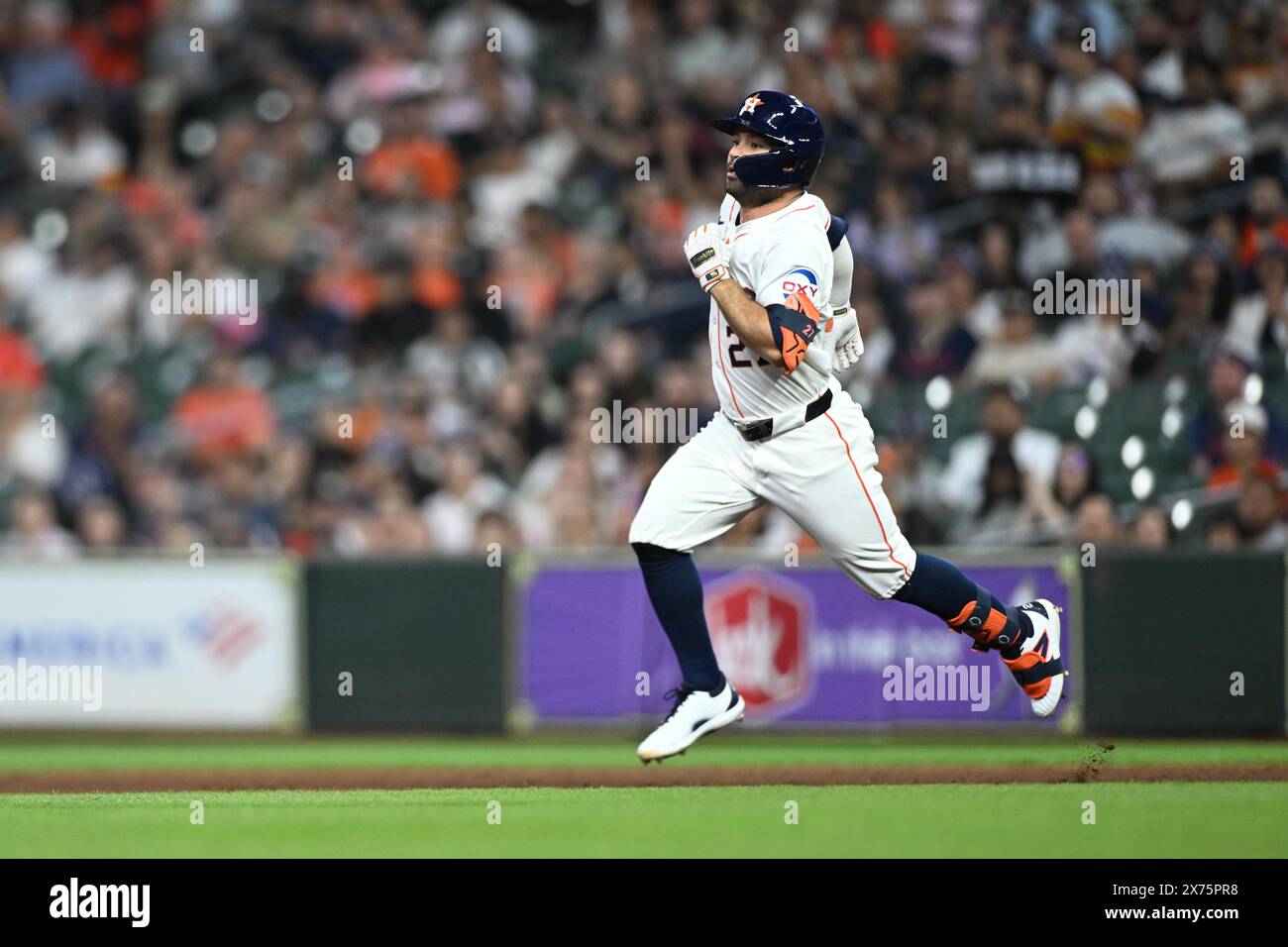 Houston Astros second base Jose Altuve (27) gets the 2100th hit of his career with a double in ...