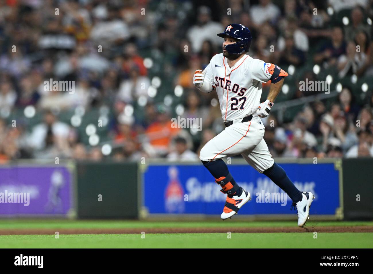 Houston Astros second base Jose Altuve (27) gets the 2100th hit of his career with a double in ...