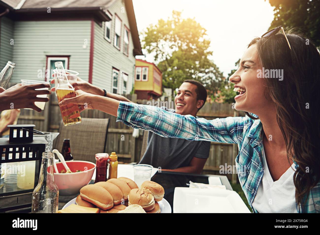 Outdoor, people and friends in alcohol, cheers and celebration for ...