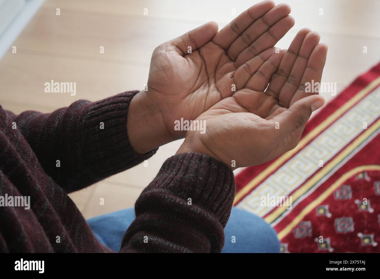 muslim man keep hand in praying gestures during ramadan, Close up Stock ...