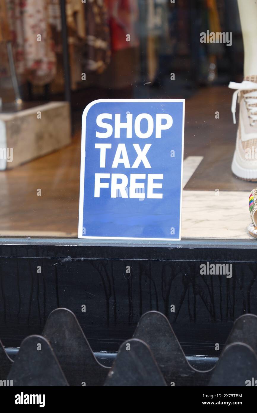 shop tax free text duty free shop sign on shop window Stock Photo - Alamy