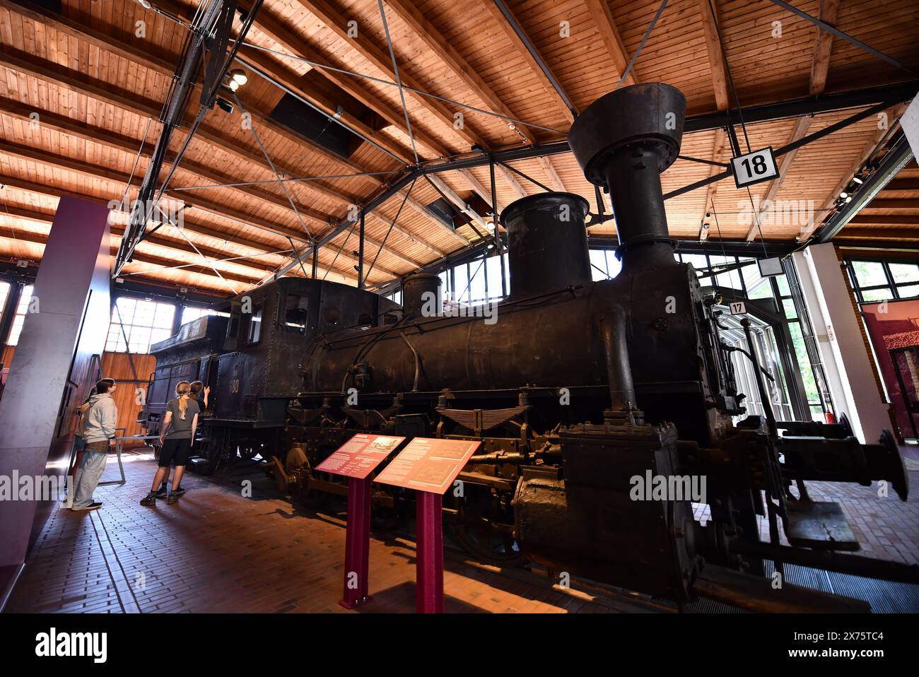 Berlin, Germany. 17th May, 2024. Visitors view a steam locomotive at ...