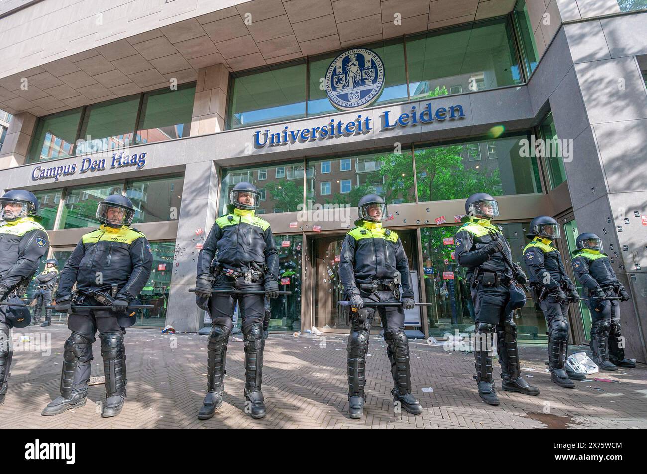 Police form a buffer zone between demonstrating students and the ...
