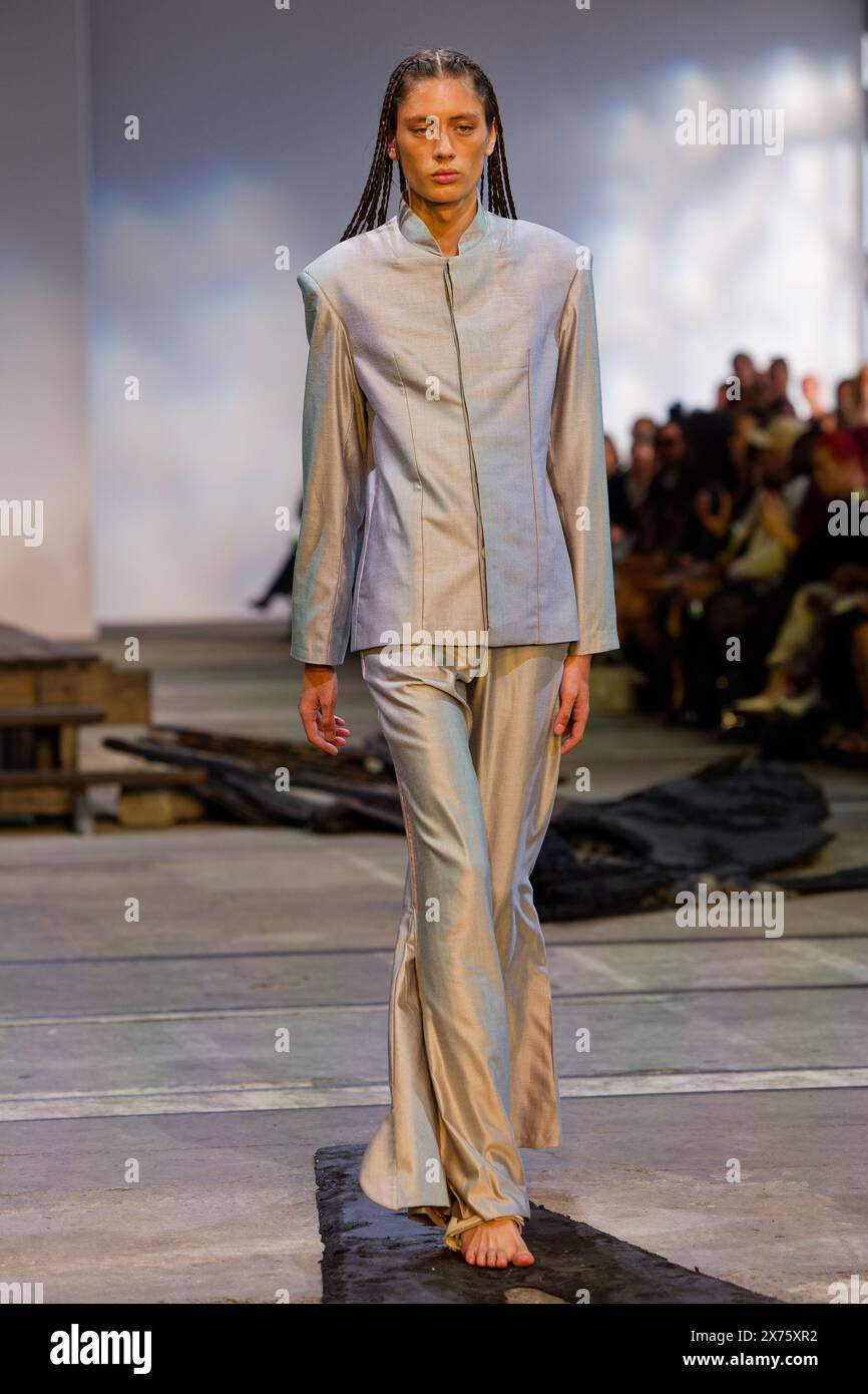 Sydney, Australia. 17th May, 2024. A model walks the runway during the ...