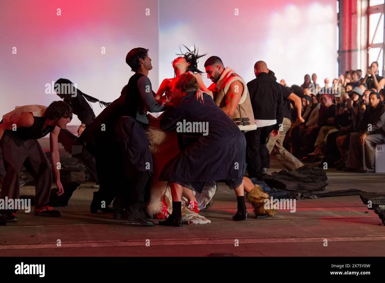 Sydney, Australia. 17th May, 2024. A model is transformed on the runway ...