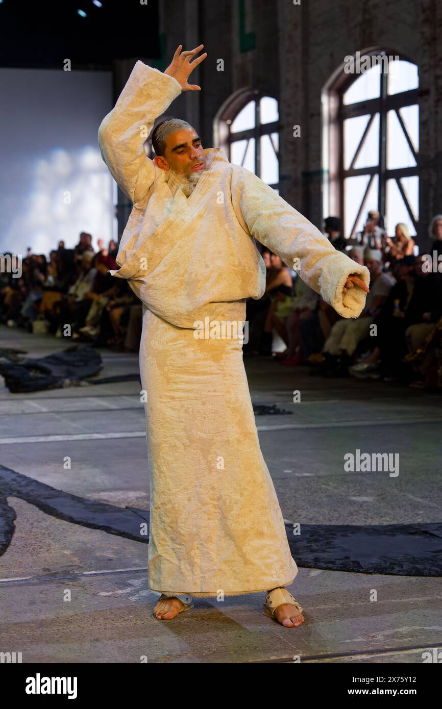 Sydney, Australia. 17th May, 2024. A model walks the runway during the ...