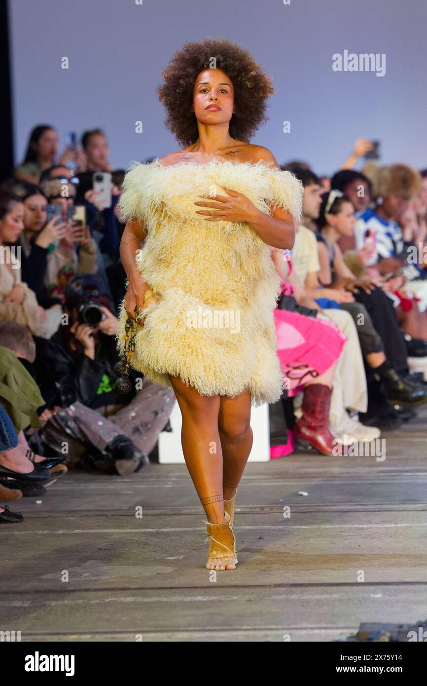 Sydney, Australia. 17th May, 2024. A model walks the runway during the ...
