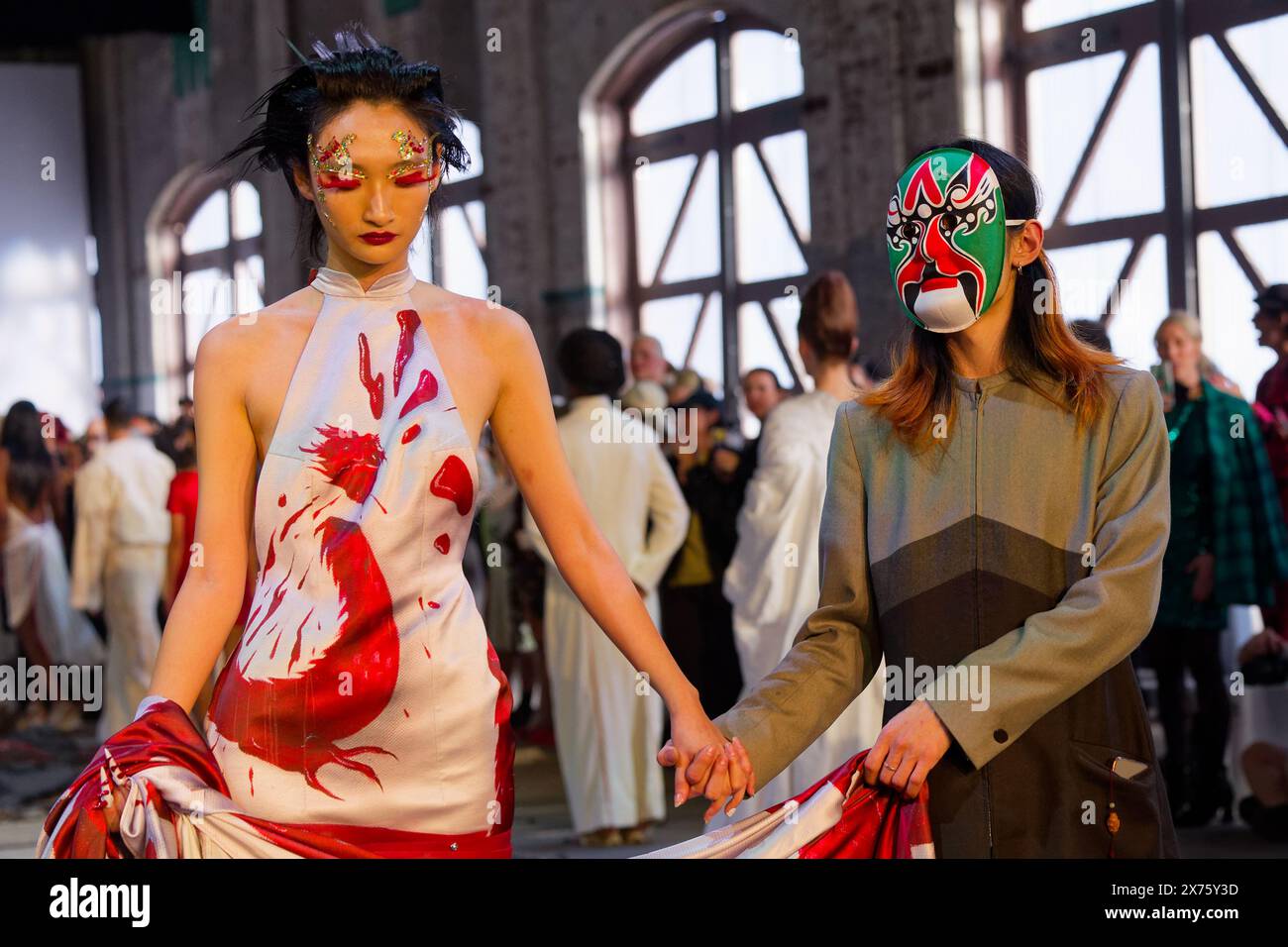 Sydney, Australia. 17th May, 2024. Designer Jackie Wu (R) thanks the ...