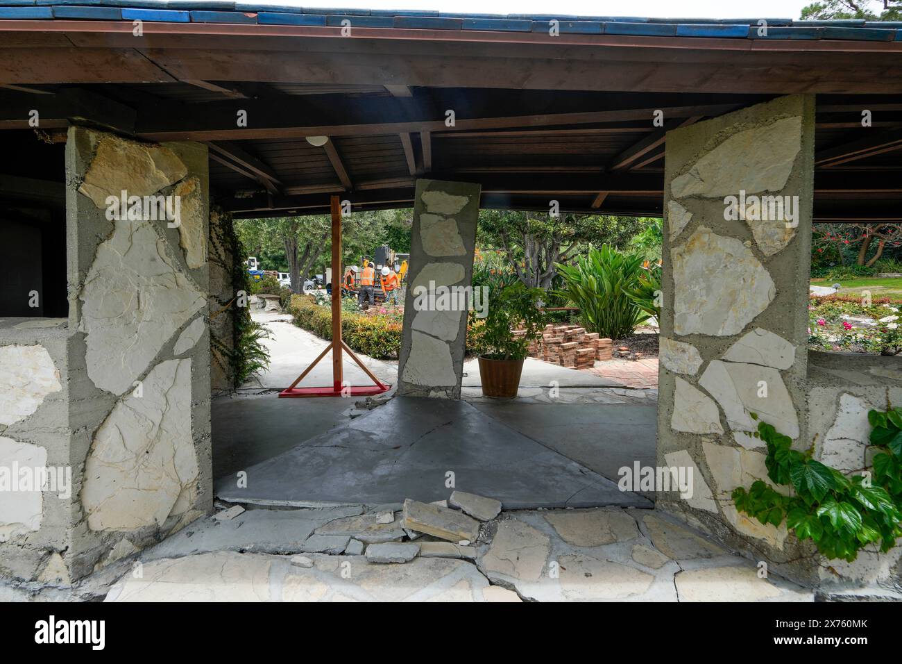 Wood beams support tilted hall walls next to the Wayfarers Chapel ...