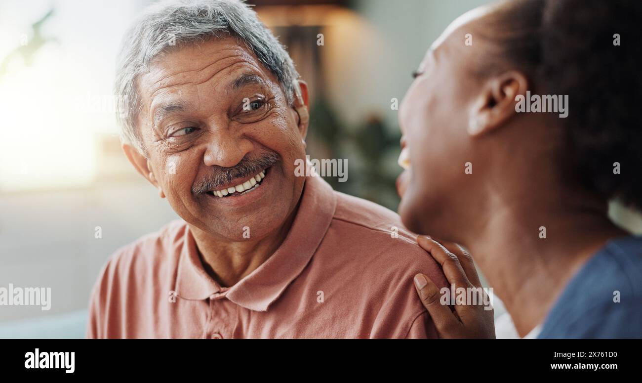 Nurse, man and hearing aid on ear for medical support, wellness and ...