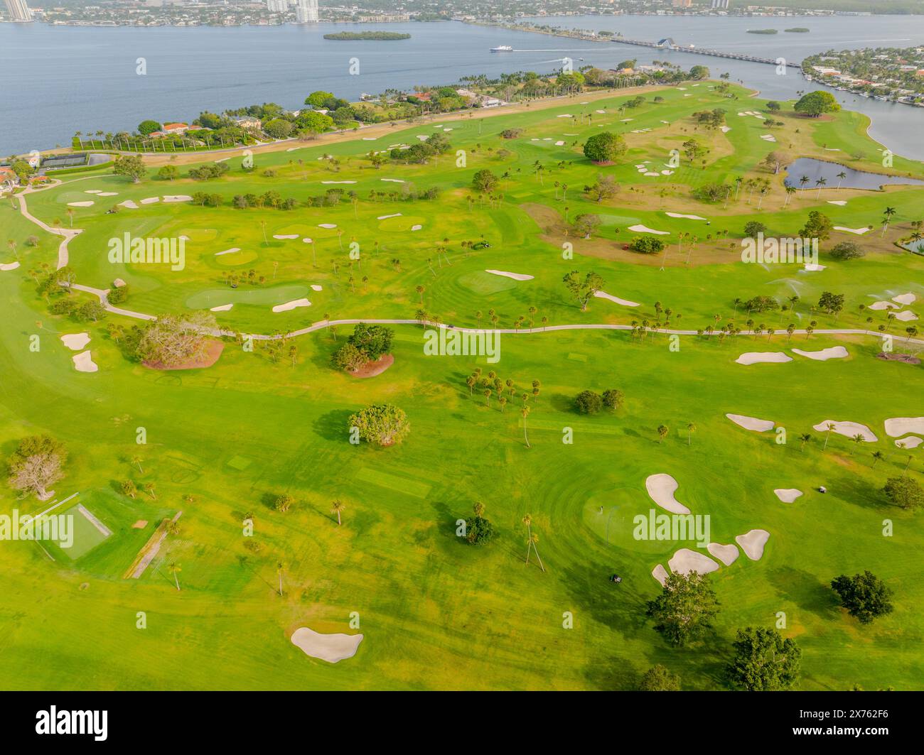 Aerial view golf course on water Stock Photo - Alamy
