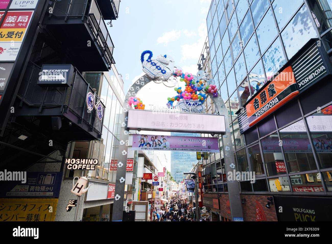 Takeshita Street in Harajuku in the city of Tokyo is a cultural ...